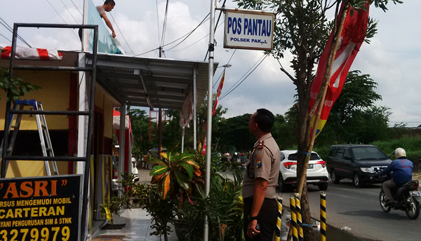 Spanduk Pos Pantau Natal dan Tahun Baru Dibersihkan – PETISI.CO